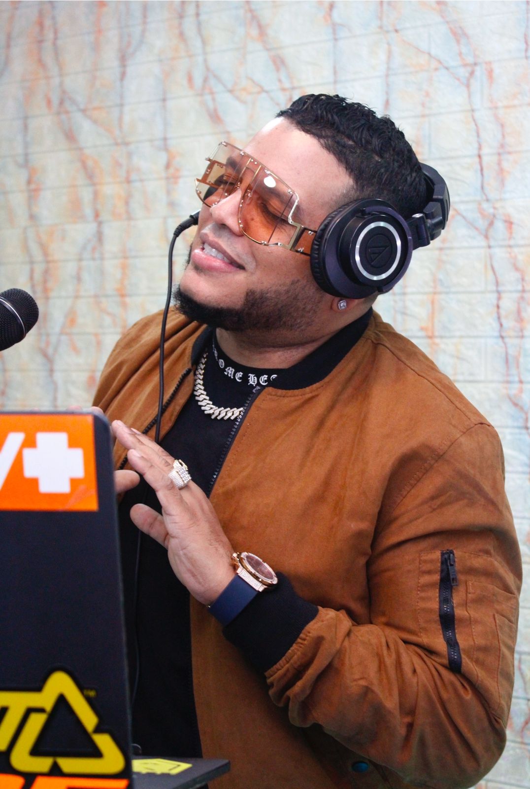 DJ Joe "Catador" celebrates the success of his mixes on YouTube, as he ...